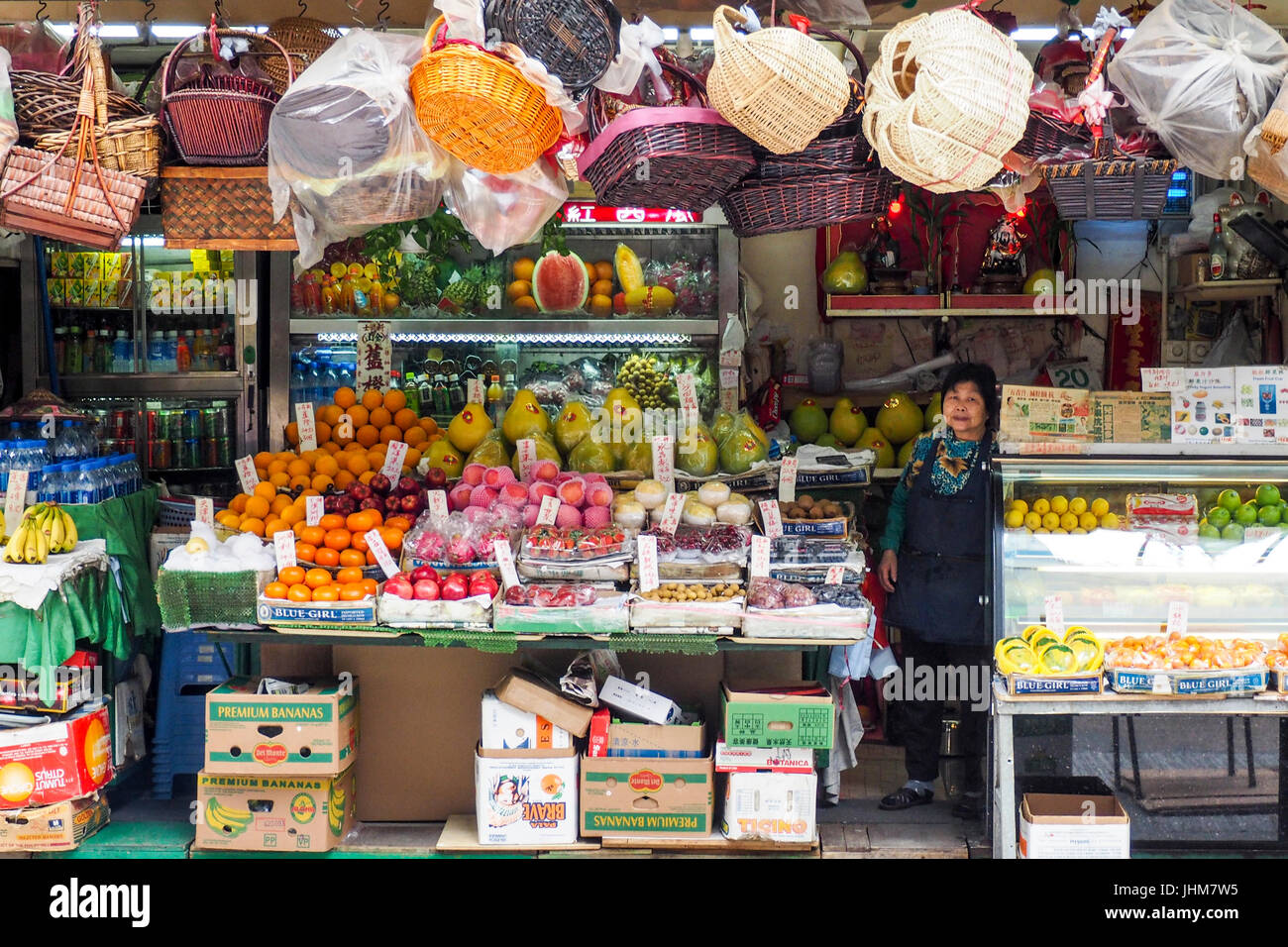 Asian shopkeeper hi-res stock photography and images - Alamy