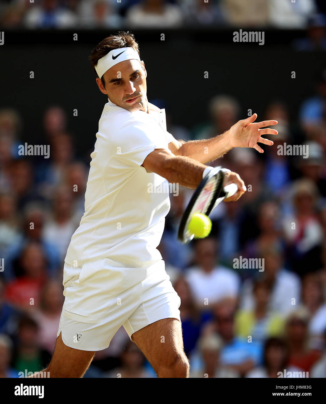 Roger Federer in action against Tomas Berdych on day eleven of the ...