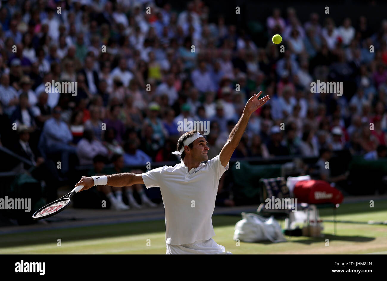 Roger Federer in action against Tomas Berdych on day eleven of the ...