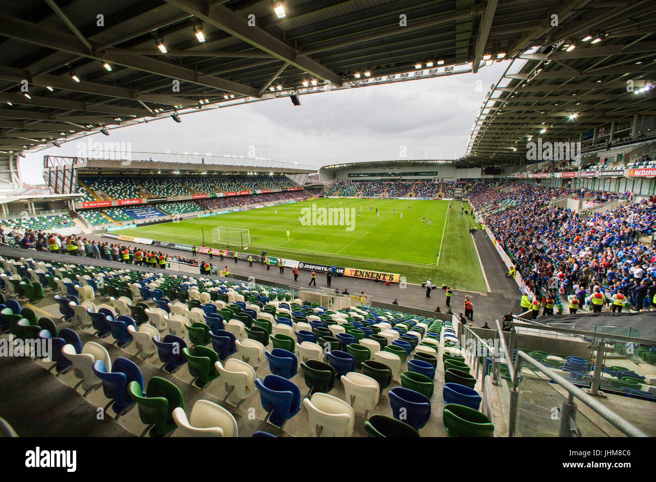 Celtic fans (left) and Linfield fans (right) watch on during the UEFA ...