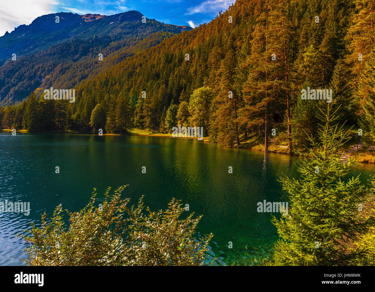 Bright colors of autumn n Austrian alpine lakes Stock Photo - Alamy