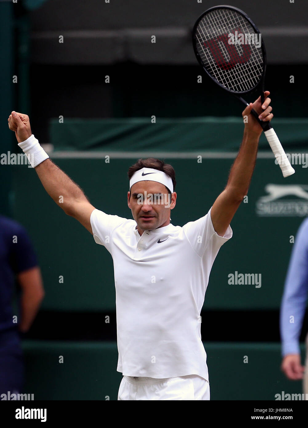 Roger Federer celebrates beating Tomas Berdych on day eleven of the ...