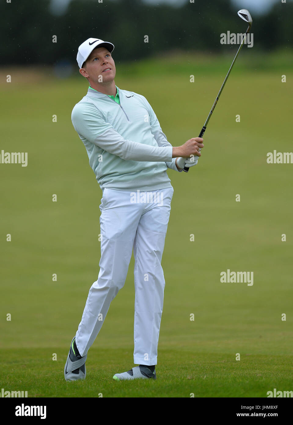 Germany's Alexander Knappe plays his second shot to the 18th hole ...