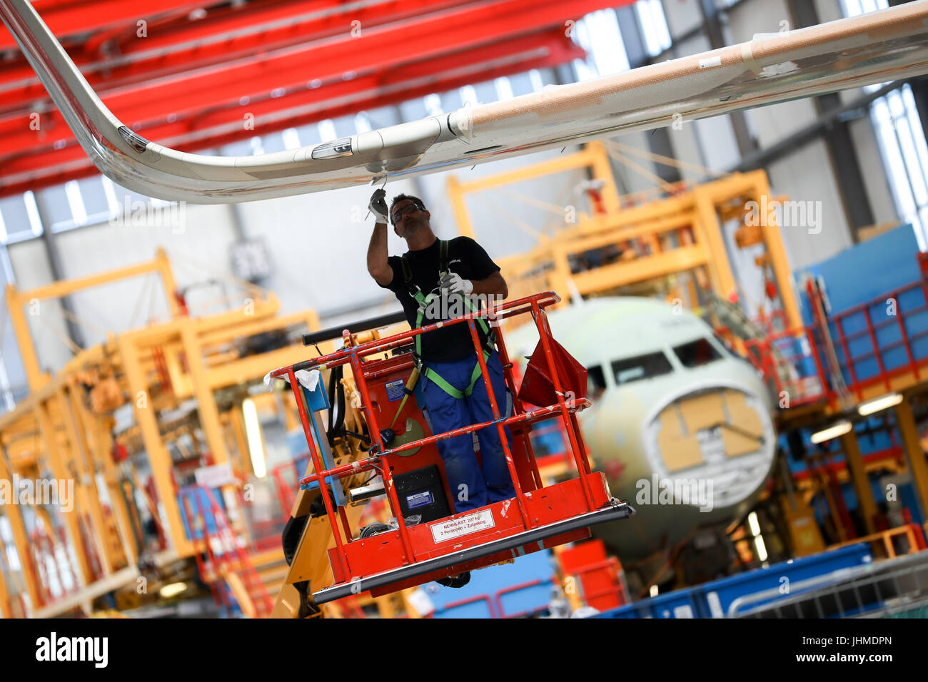 Hamburg, Germany. 14th July, 2017. Airbus employees working in the ...