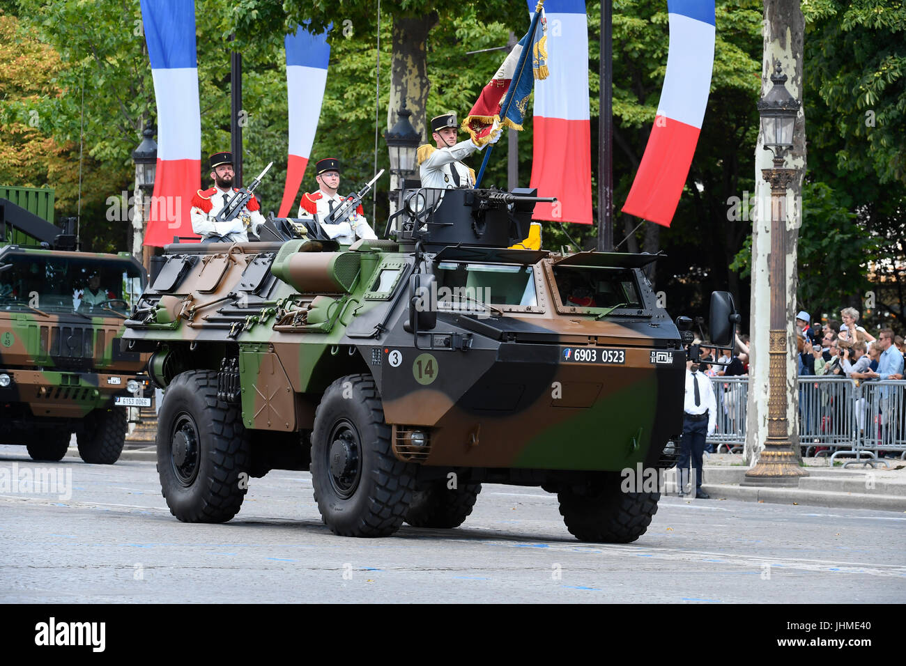 A Bastille Day military parade takes over the streets of Paris, France ...