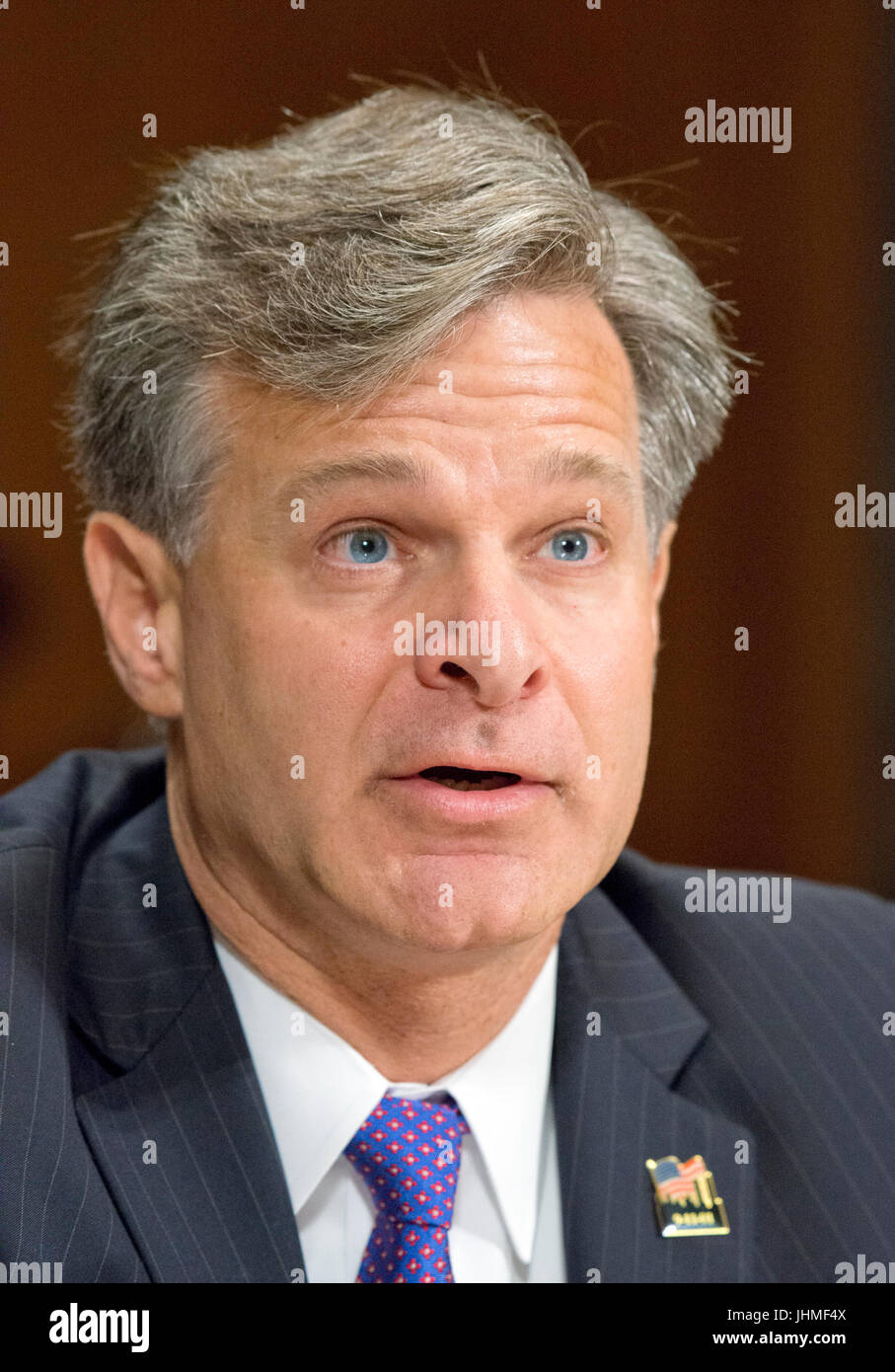 Washington, Us. 12th July, 2017. Christopher A. Wray testifies on his ...