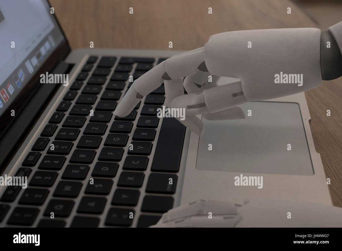 Robot using a laptop Stock Photo - Alamy