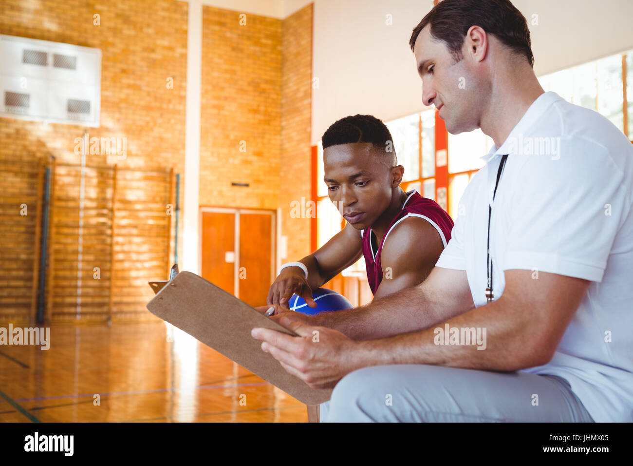 Sport uniform sitting in bench hi-res stock photography and images - Alamy