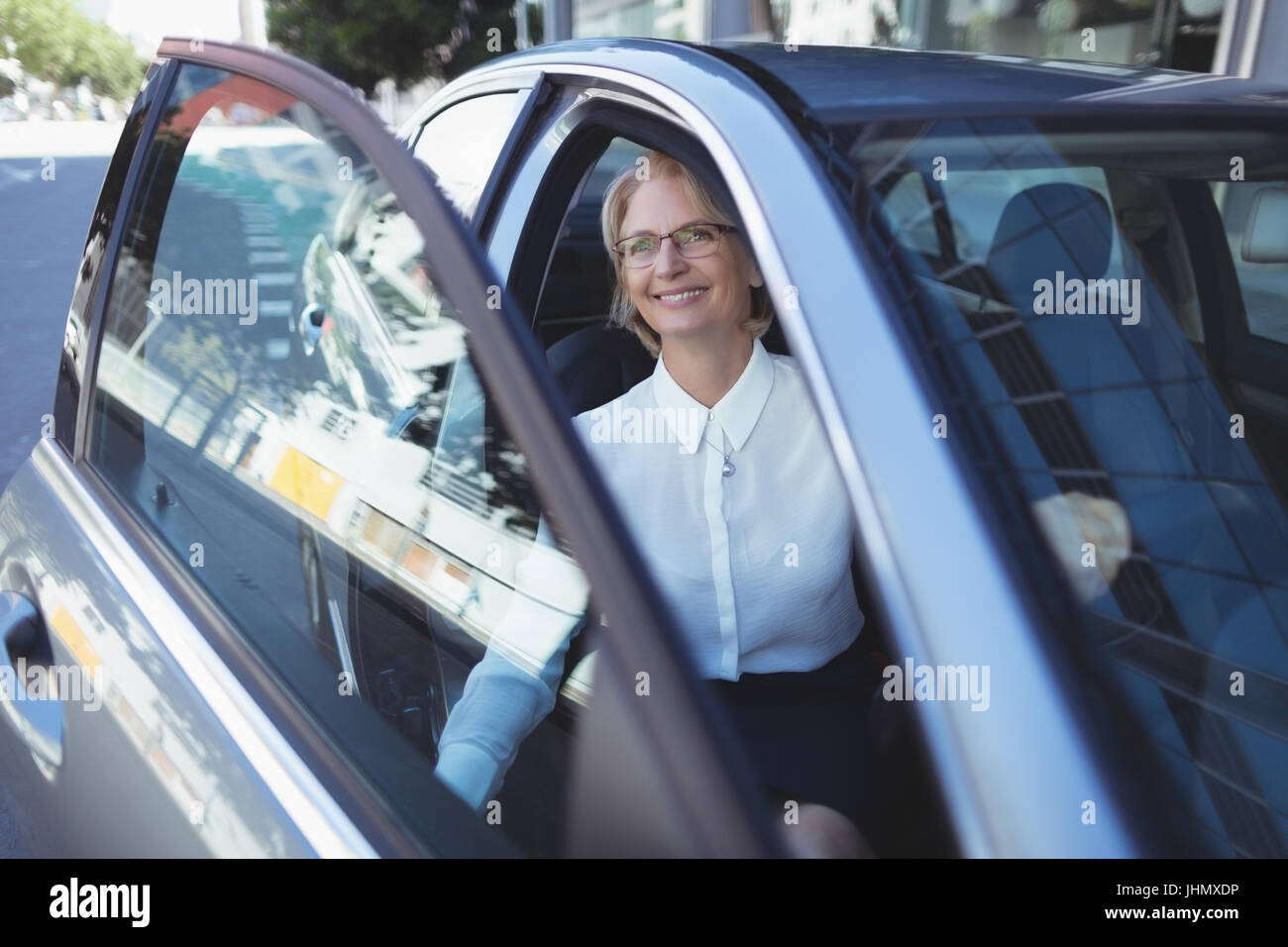 Female exiting car hi-res stock photography and images - Alamy