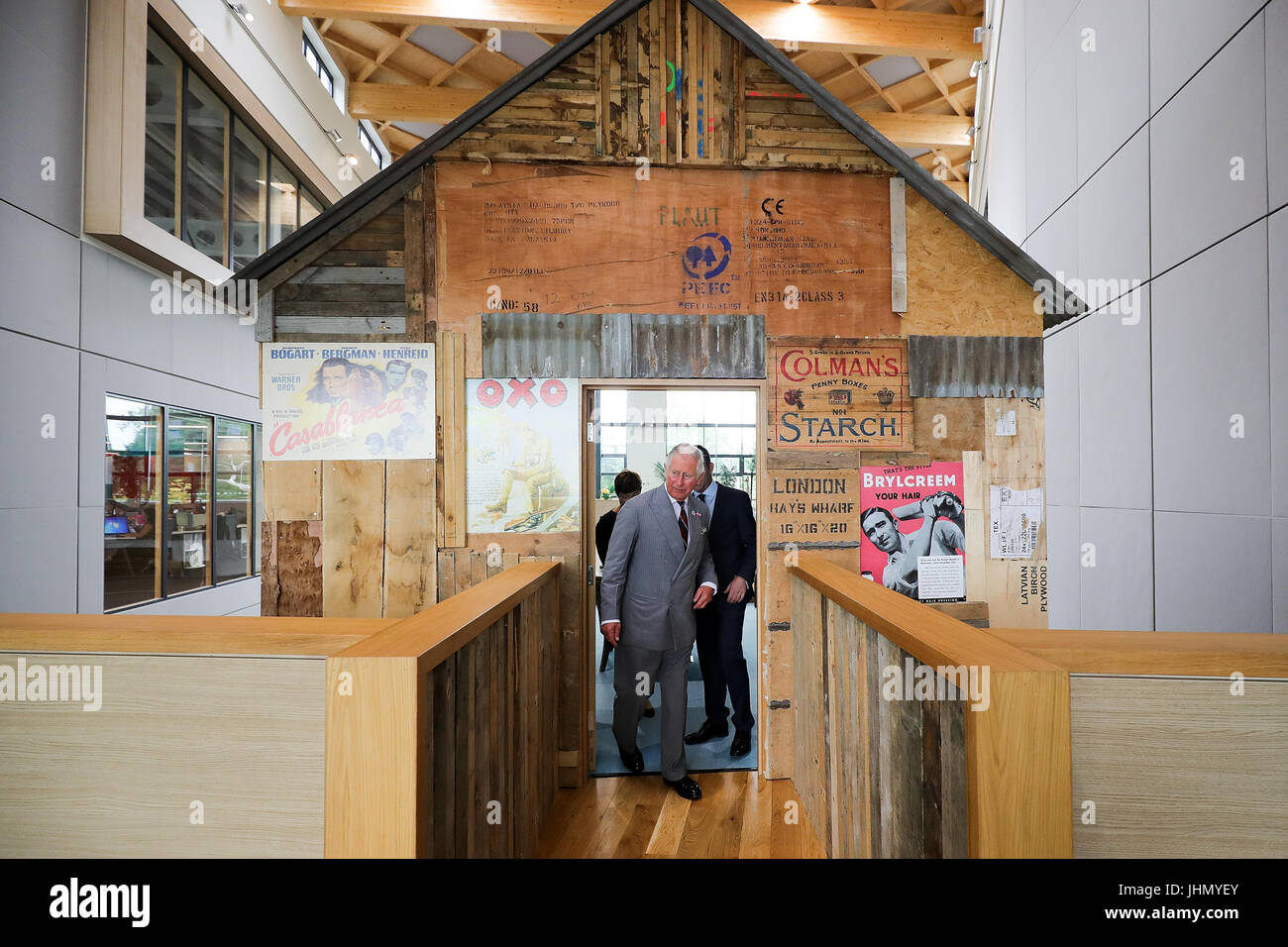The Prince of Wales views the tree house with Moneypenny co-founders Ed ...