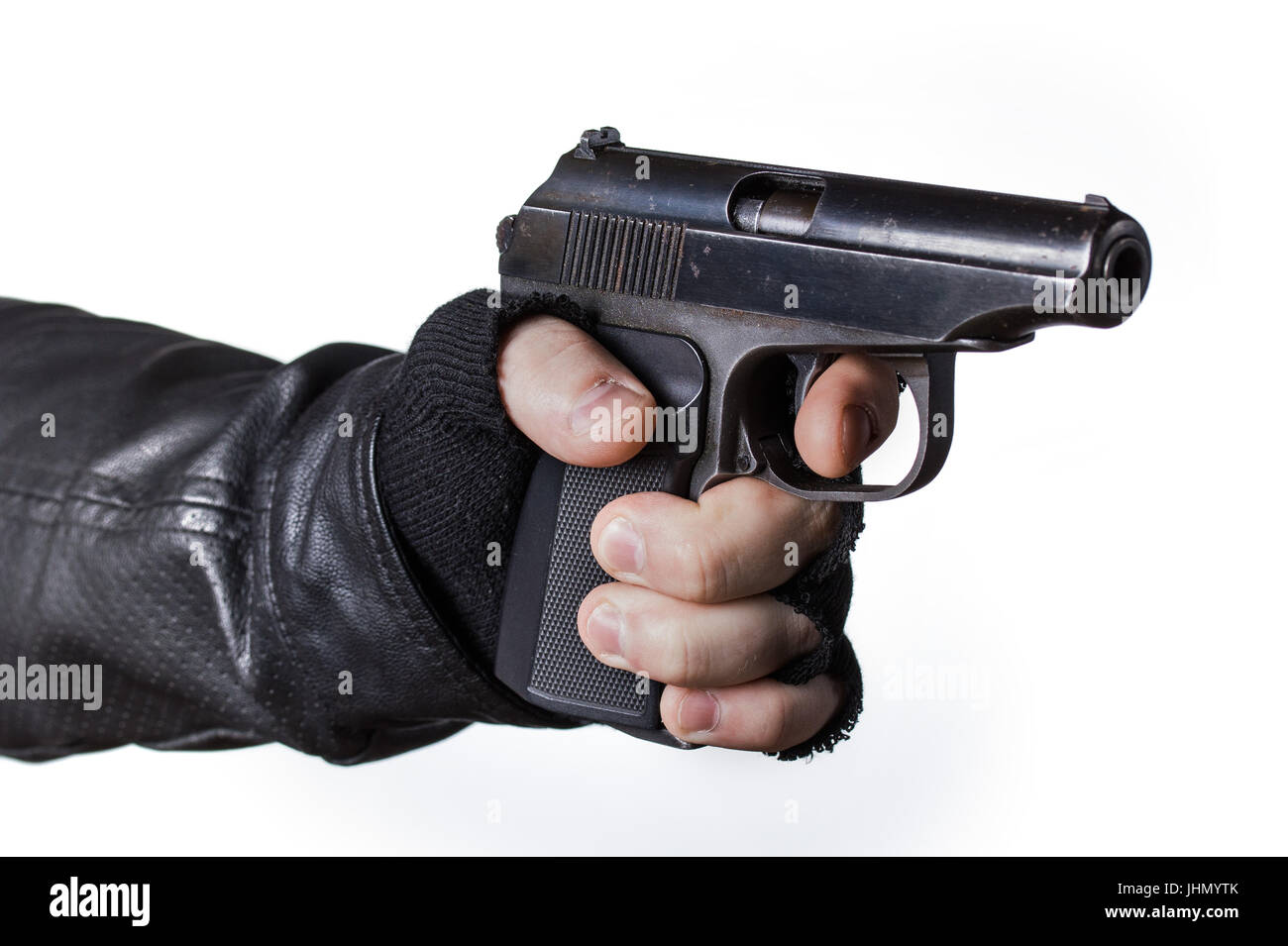 Gangster with a gun in his hand and a leather jacket on a white ...