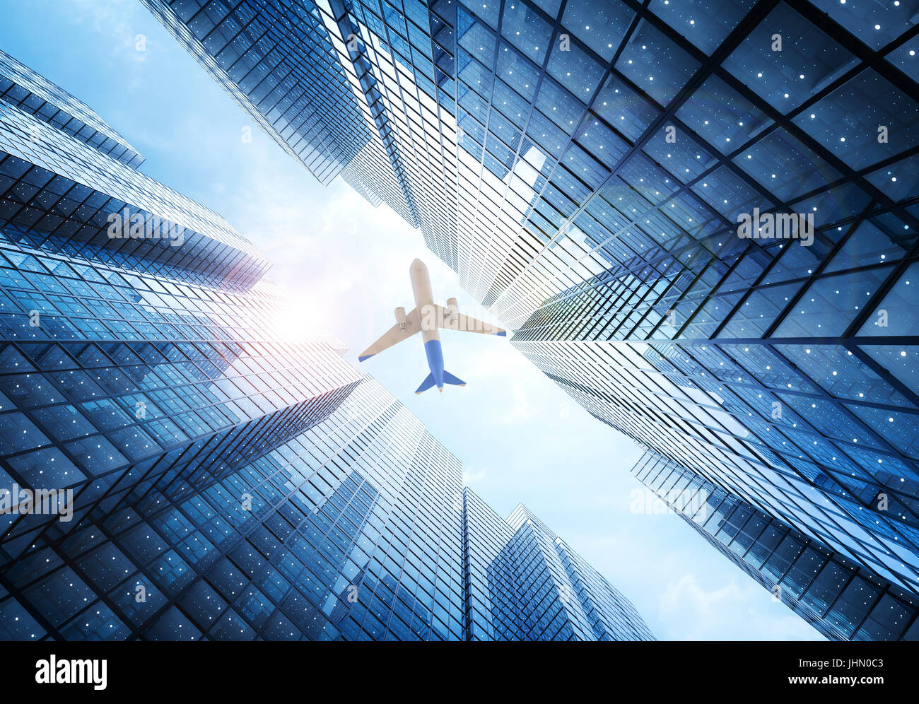 3d rendering airplane flying above building Stock Photo - Alamy