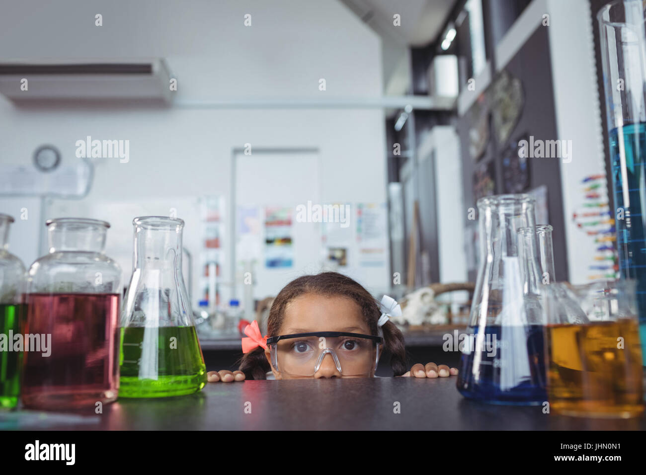 Hiding behind school desk hi-res stock photography and images - Alamy