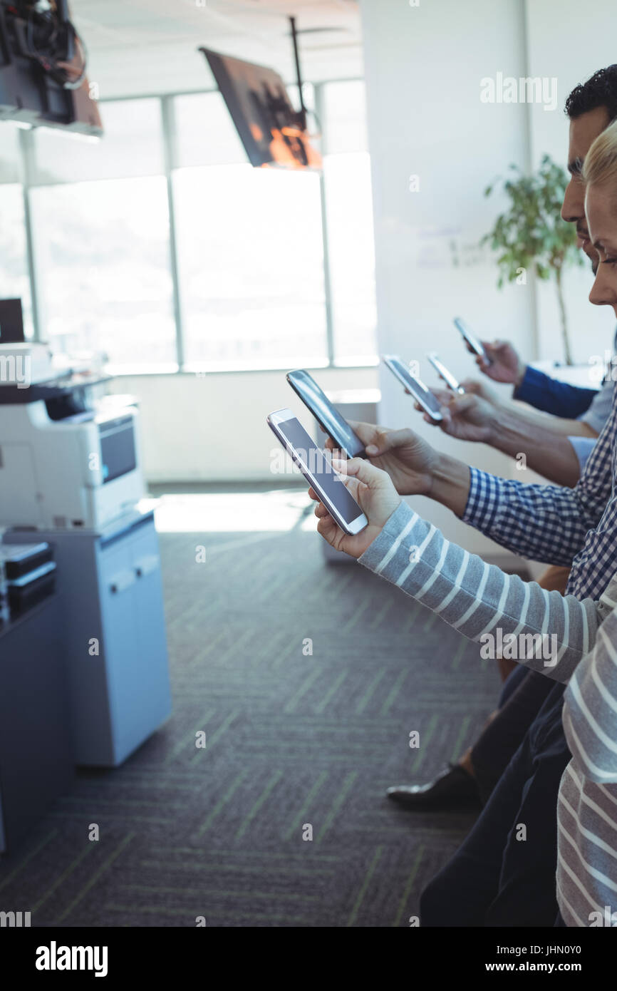Row of mobile phones hi-res stock photography and images - Alamy