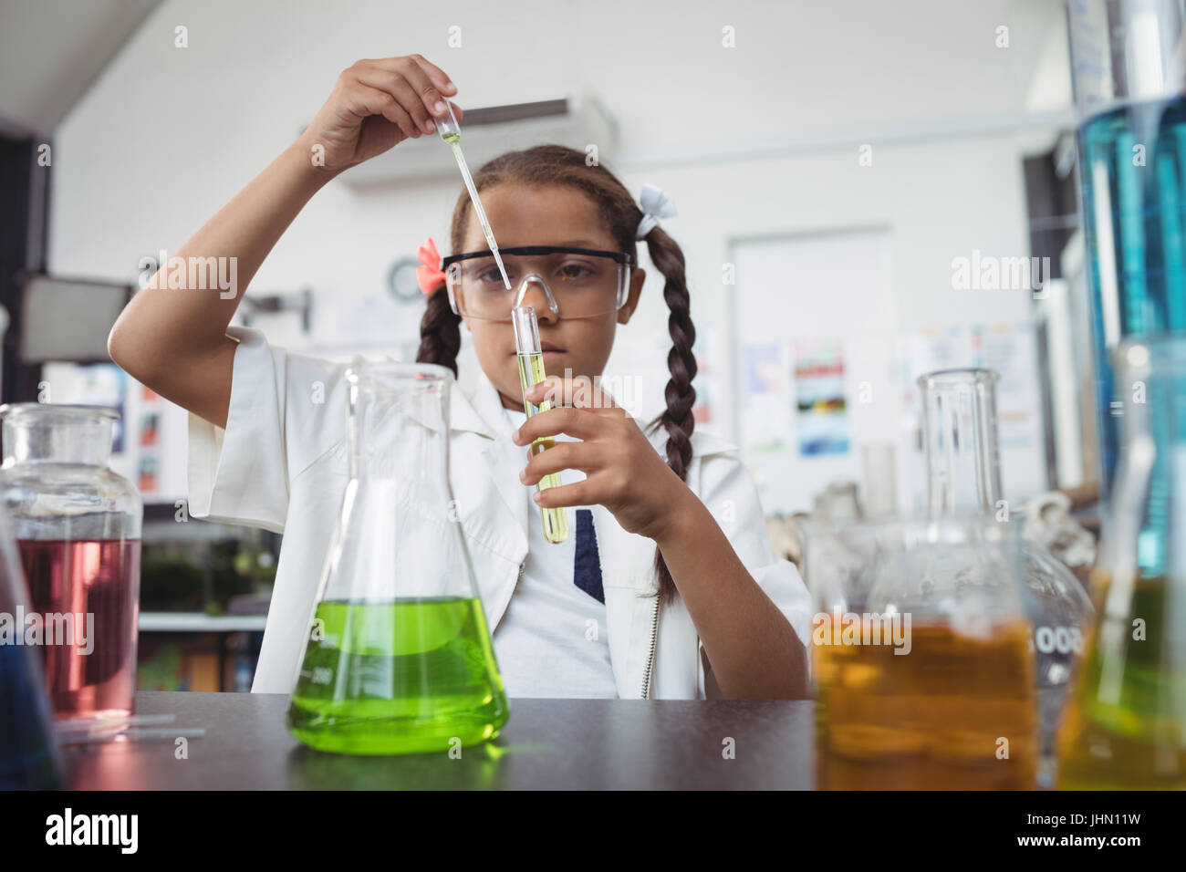 Chemistry student doing experiment hi-res stock photography and images ...