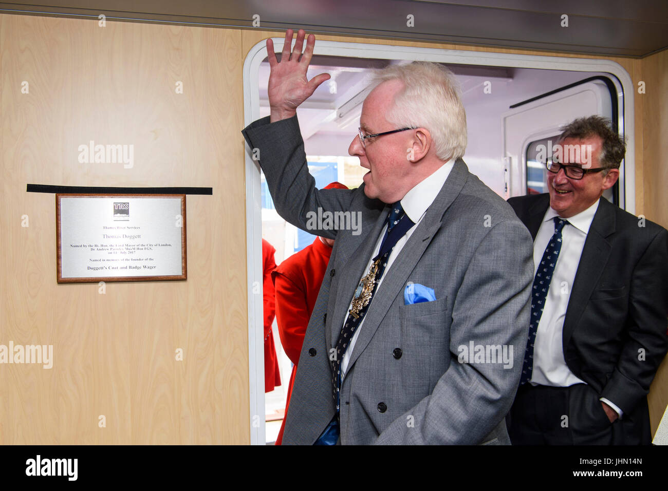 Lord Mayor Andrew Parmley officially names the vessel, as the Thomas ...