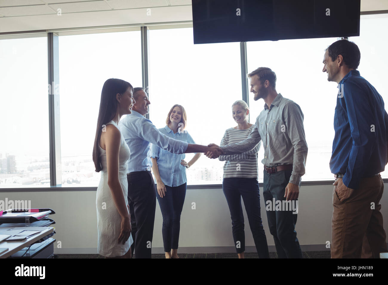 Work place shaking hands hi-res stock photography and images - Alamy