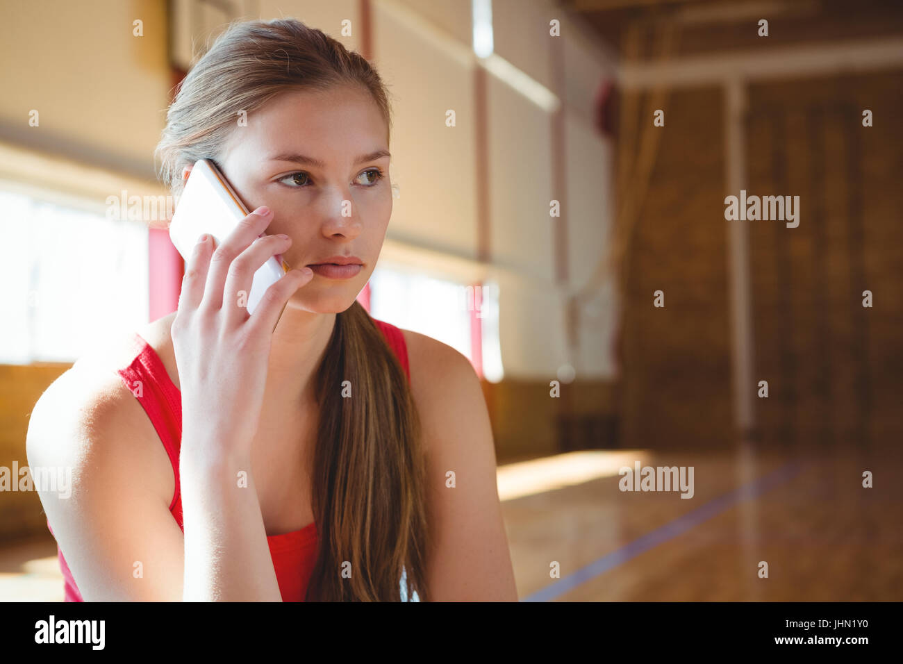 Talking on the phone at game hi-res stock photography and images - Alamy