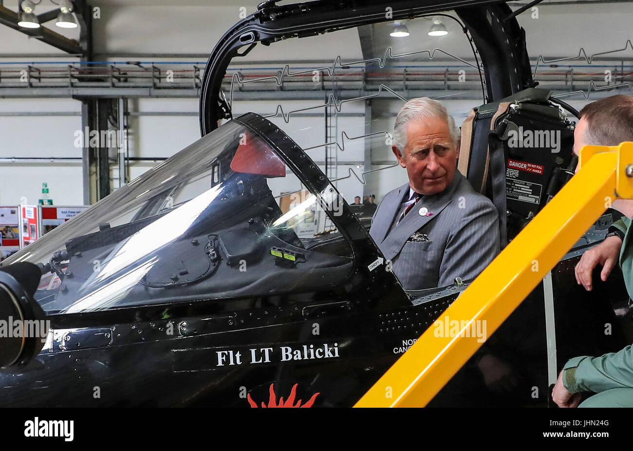 The Prince of Wales views a Hawk T2 aircraft and meets cadets, pilots ...