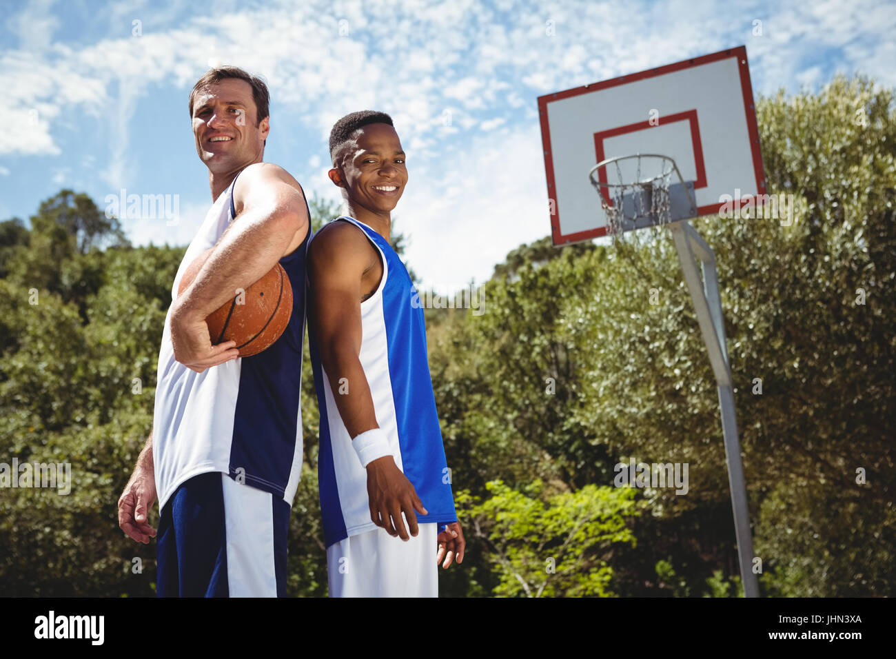 Happy basketball hi-res stock photography and images - Alamy