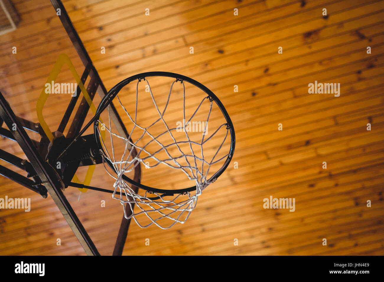 Low angle view of basket ball hoop in court Stock Photo - Alamy