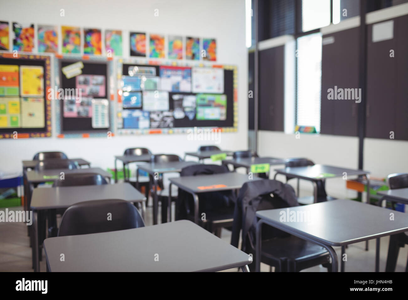 Empty classroom desks hi-res stock photography and images - Alamy