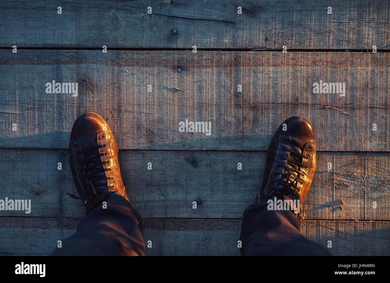 Shoe above man conceptual hi-res stock photography and images - Alamy