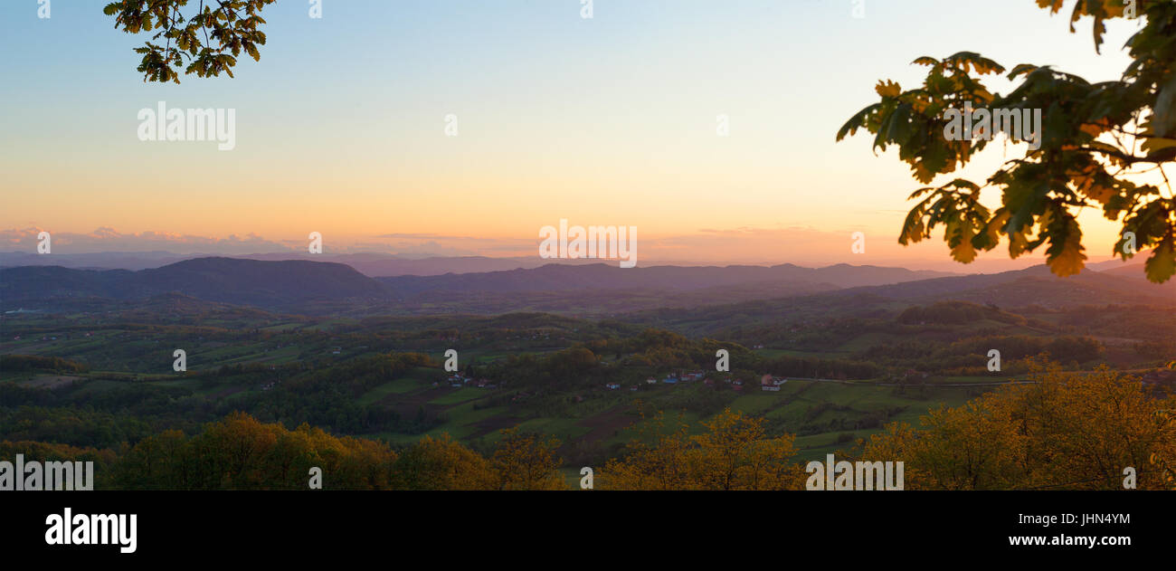 Landscape of village Dragacevo in Serbia, during sunset in springtime ...