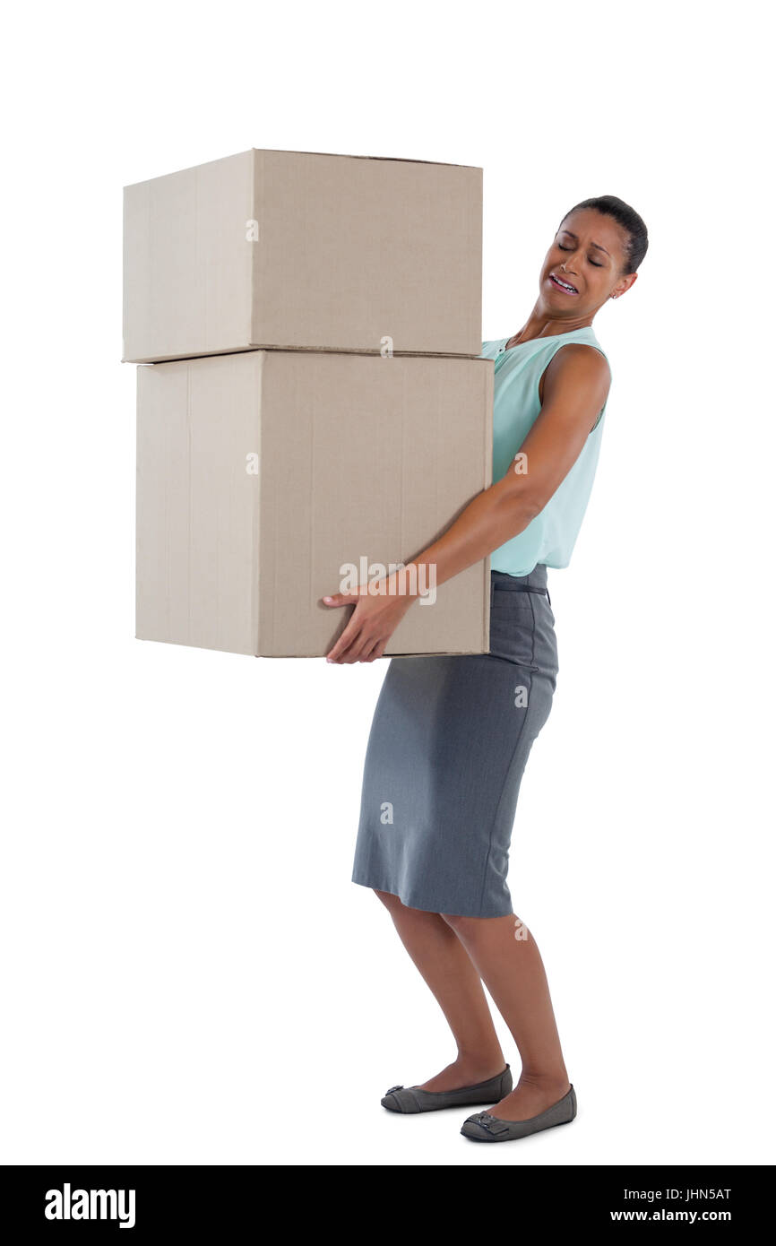 Woman carrying heavy boxes hi-res stock photography and images - Alamy