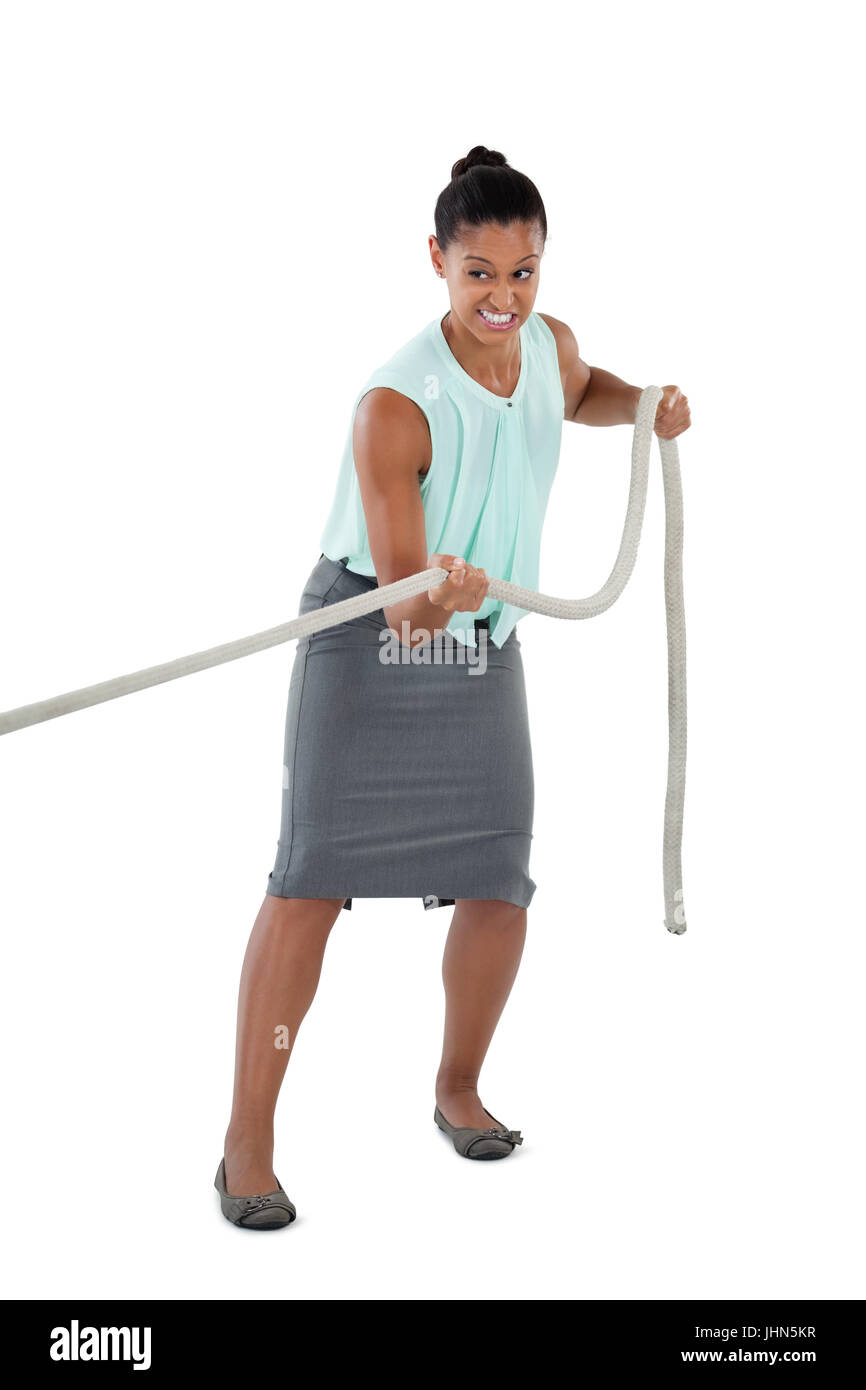 Businesswoman pulling the rope against white background Stock Photo - Alamy