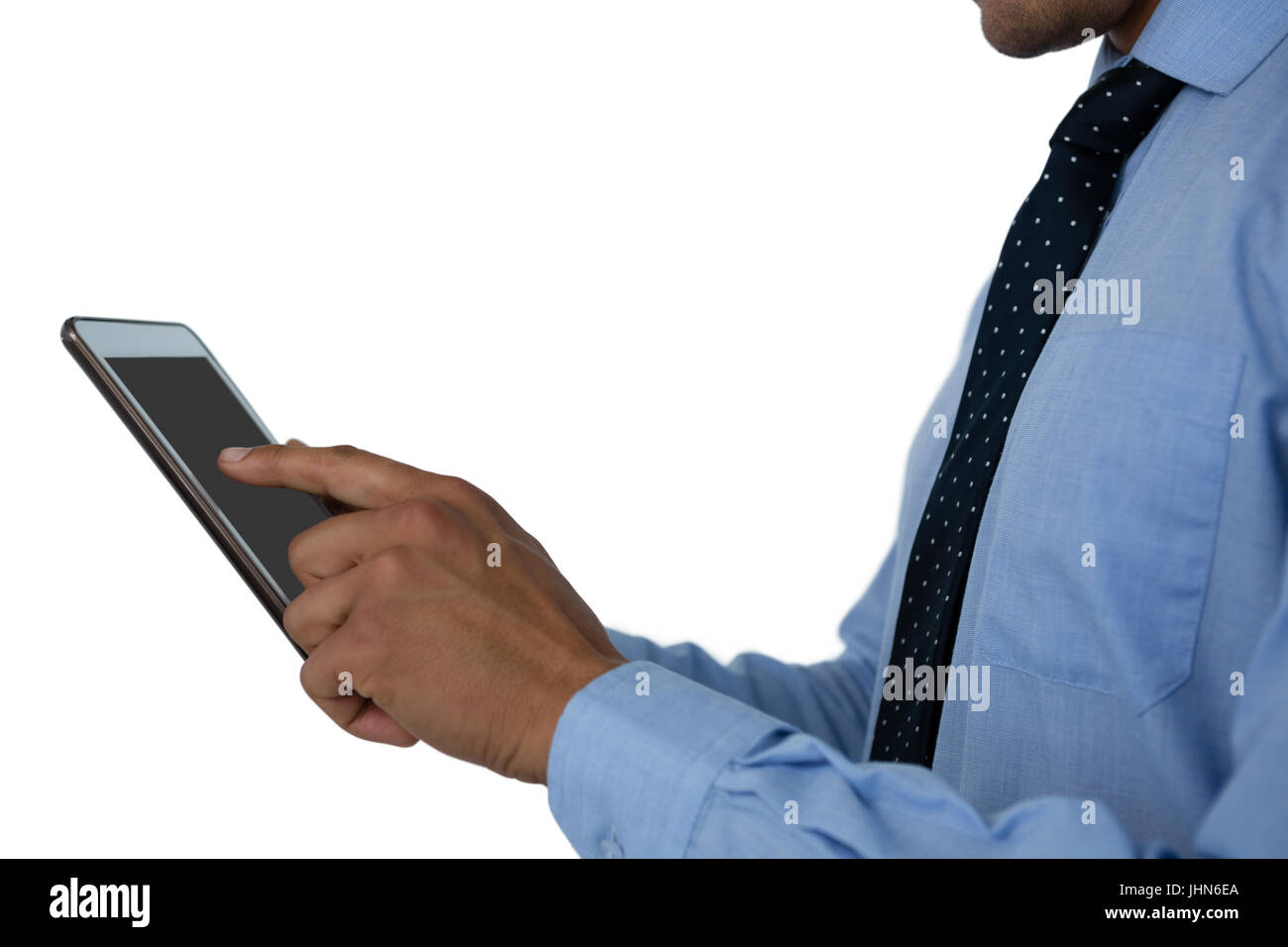 Side view of businessman using tablet against white background Stock ...