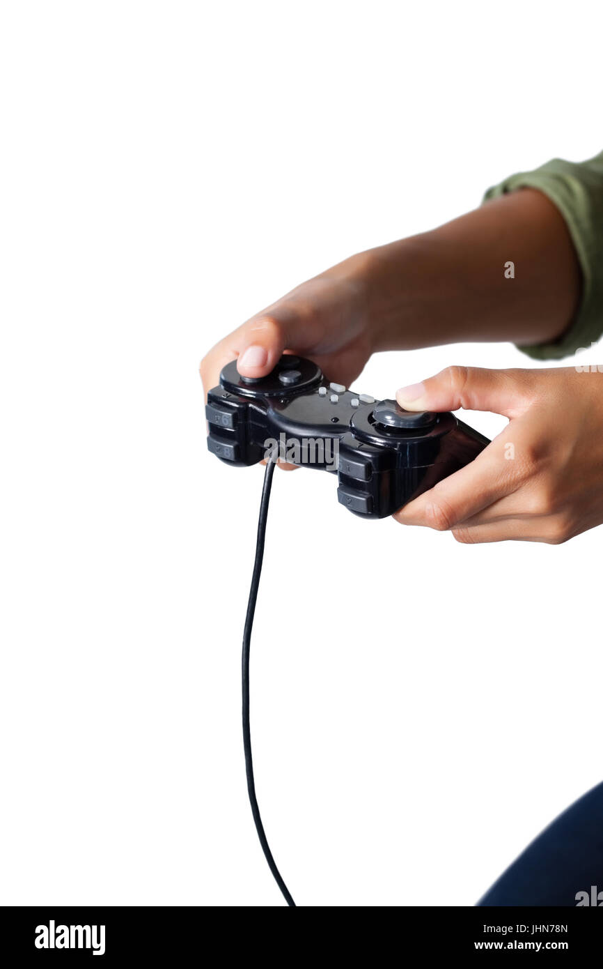 Hand of woman playing video game against white background Stock Photo ...