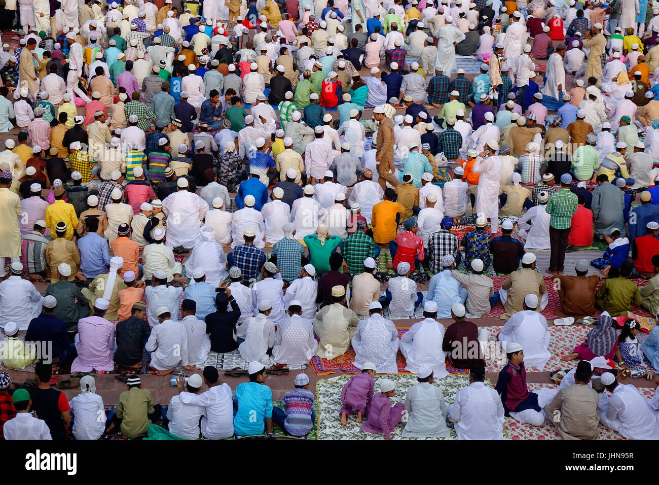 Crowd of lots of Muslim people praying namaz on occasion of Eid-Al-Fitr ...