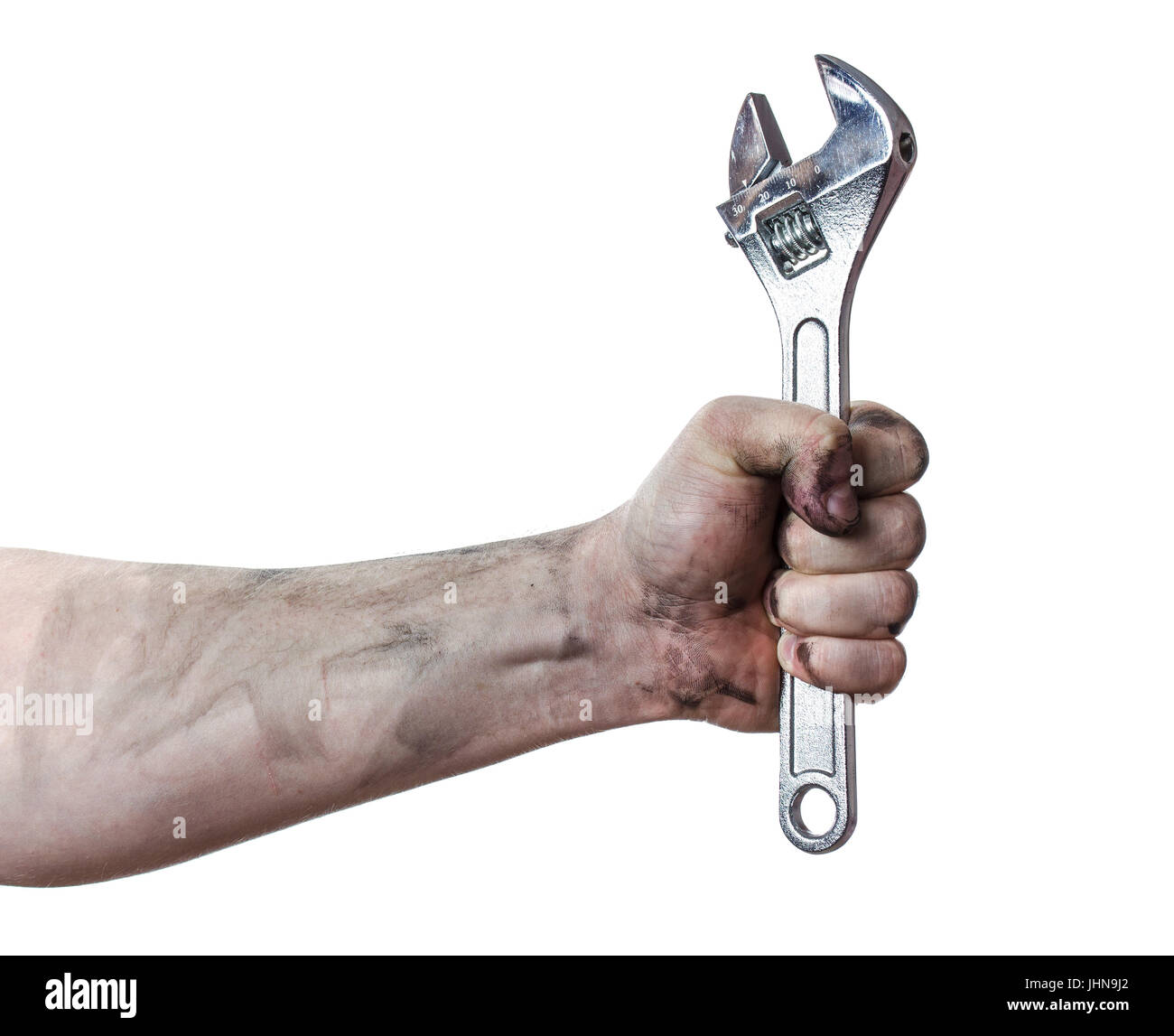 Oily hands of mechanic holding a wrench. Isolated background Stock ...