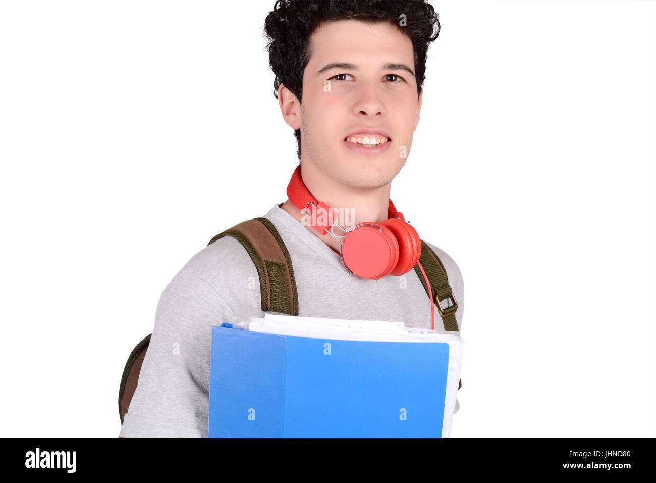 Portrait of young student holding notebook. Isolated white background ...