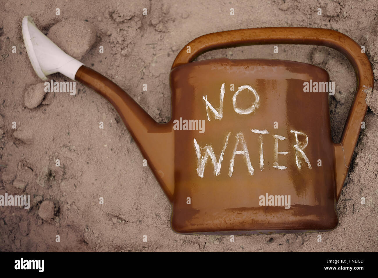 Empty watering can hi-res stock photography and images - Alamy