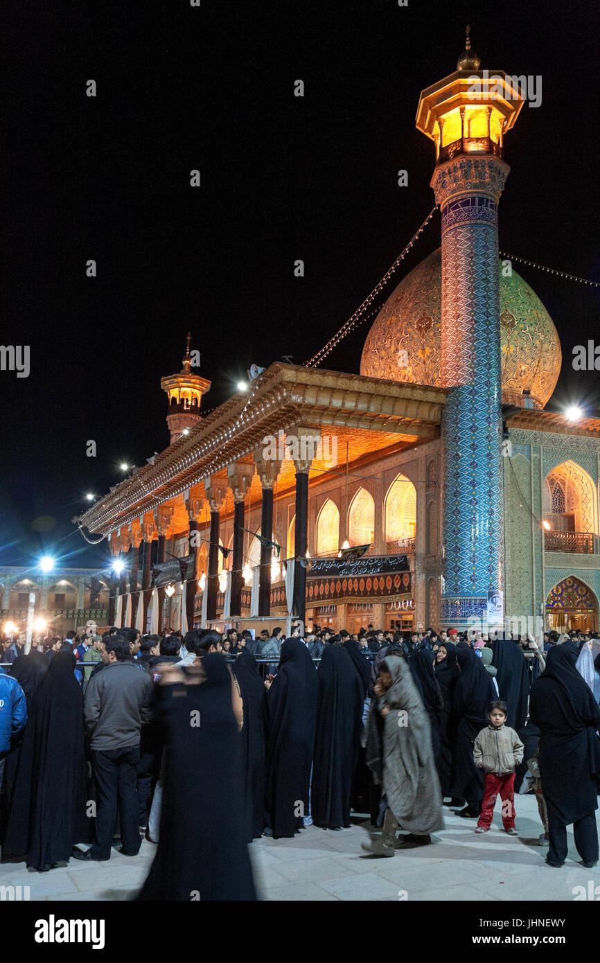 SHIRAZ, IRAN - January 2: People visit courtyard of Shah Cheragh Mosque ...