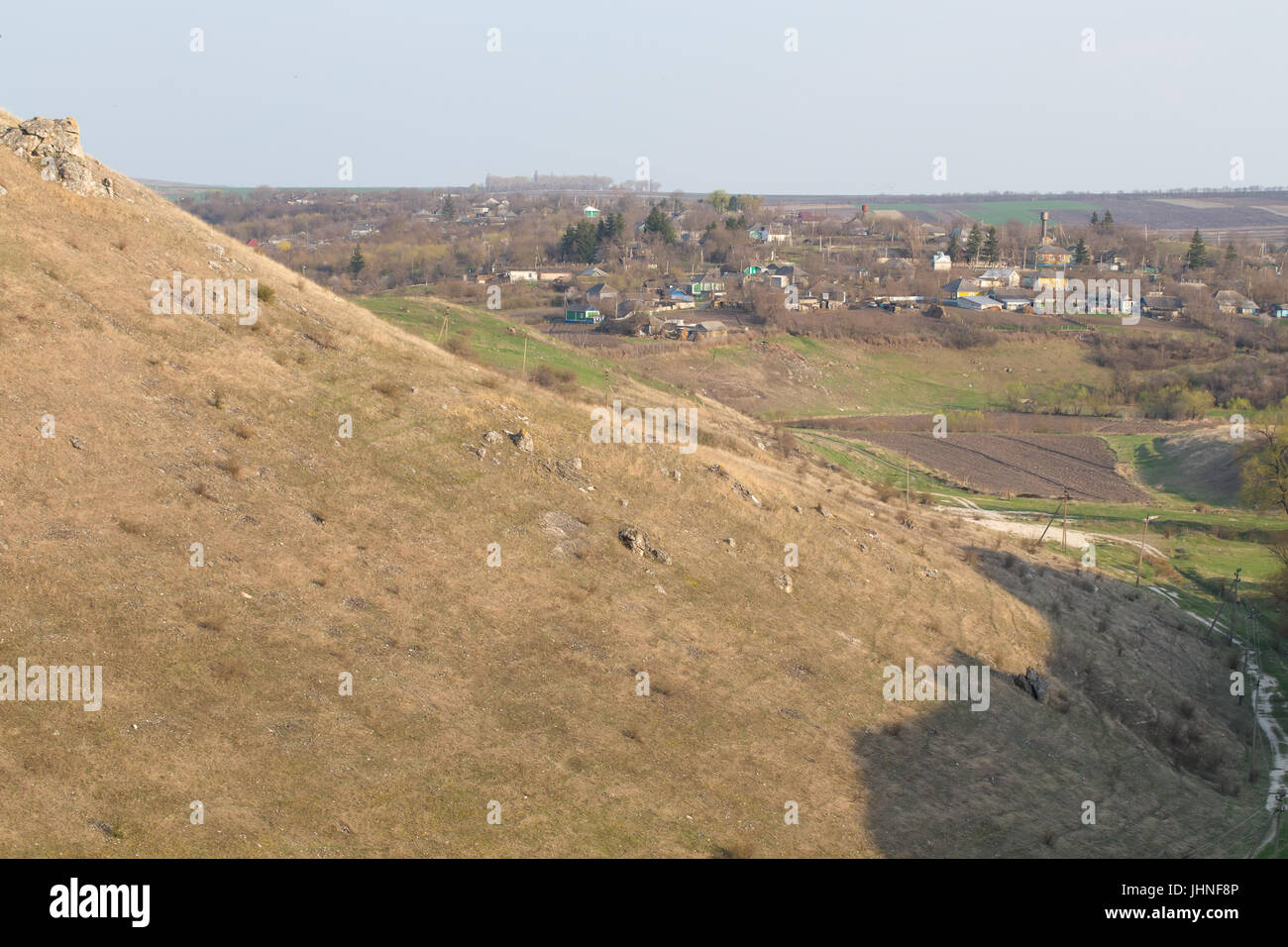 Landscape with beautiful view of village and fields Stock Photo - Alamy