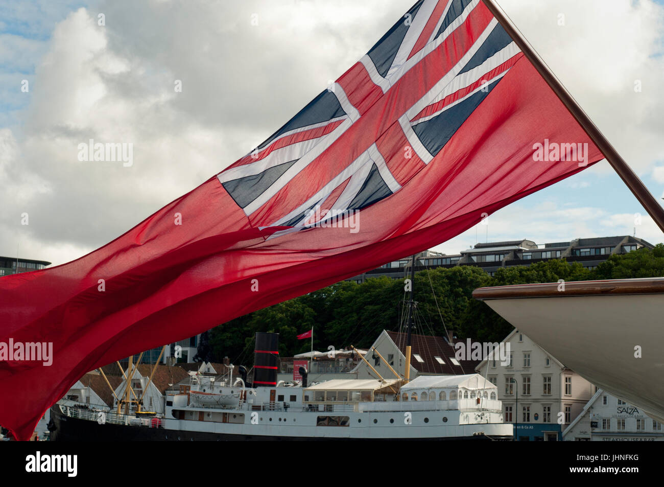 The Union Jack wawes on the stern of a yacht in Stavanger harbour Stock ...