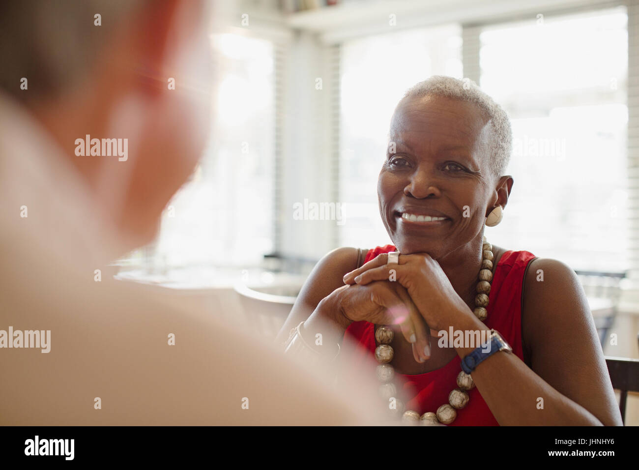 60 69 woman smiling hi-res stock photography and images - Alamy