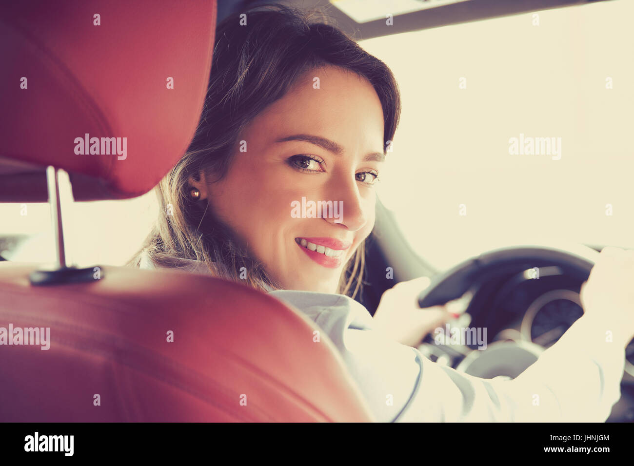 young woman driving a car Stock Photo - Alamy
