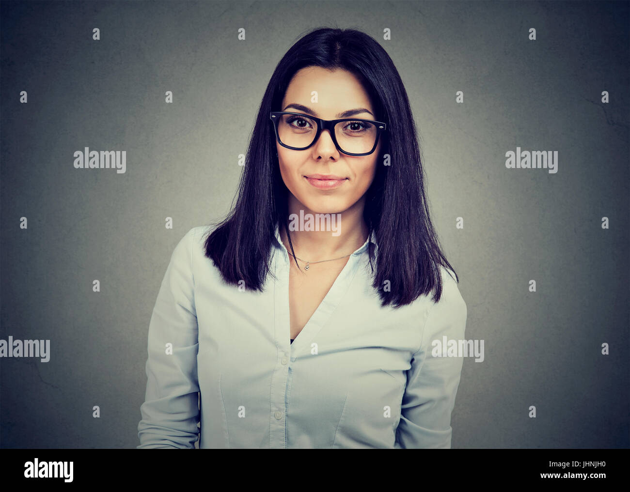 Portrait of a serious woman Stock Photo - Alamy