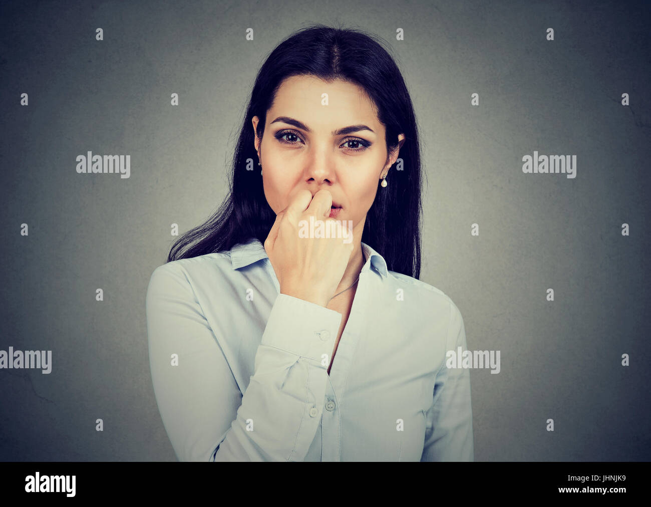 portrait of worried young woman Stock Photo - Alamy