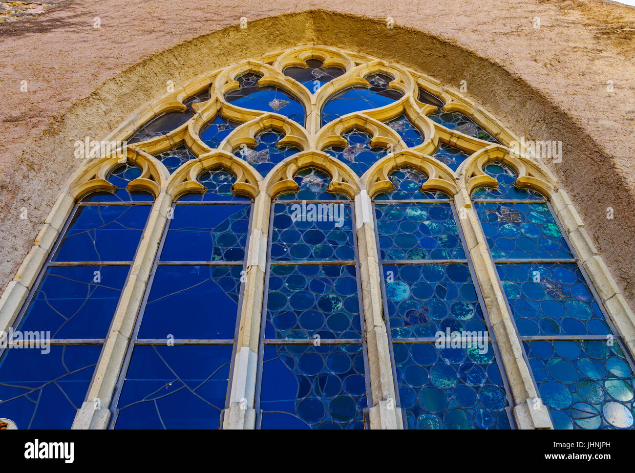 Old medieval colorful leaded-pane windows in gothic style, France ...