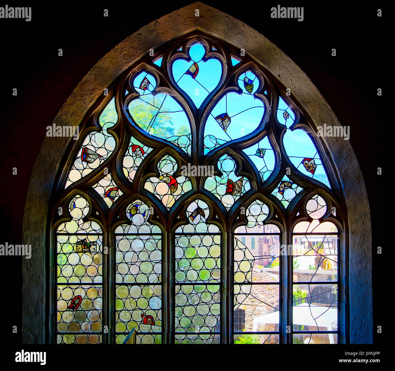 Old medieval colorful leaded-pane windows in gothic style, France ...