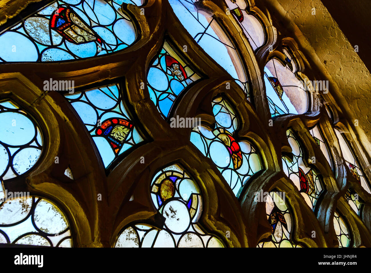 Old medieval colorful leaded-pane windows in gothic style, France ...