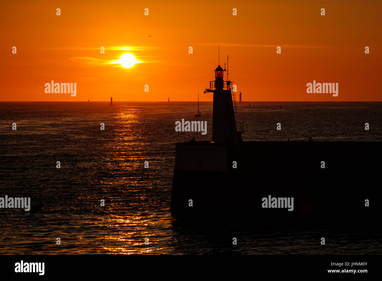 sunset behind the ferry Stock Photo - Alamy
