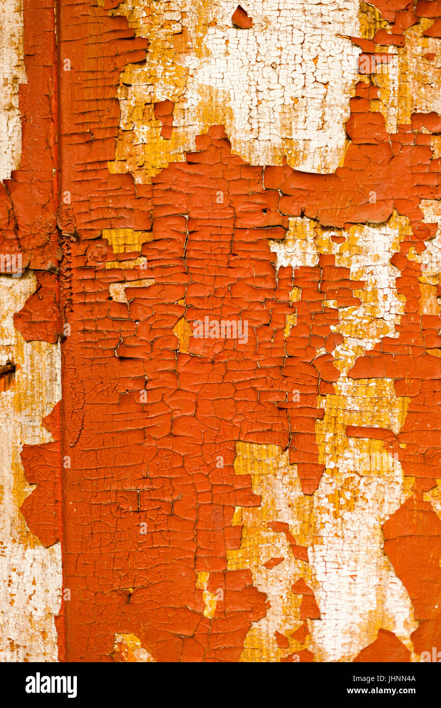 Cracked wall with old layers of paint in abandoned house. Background ...