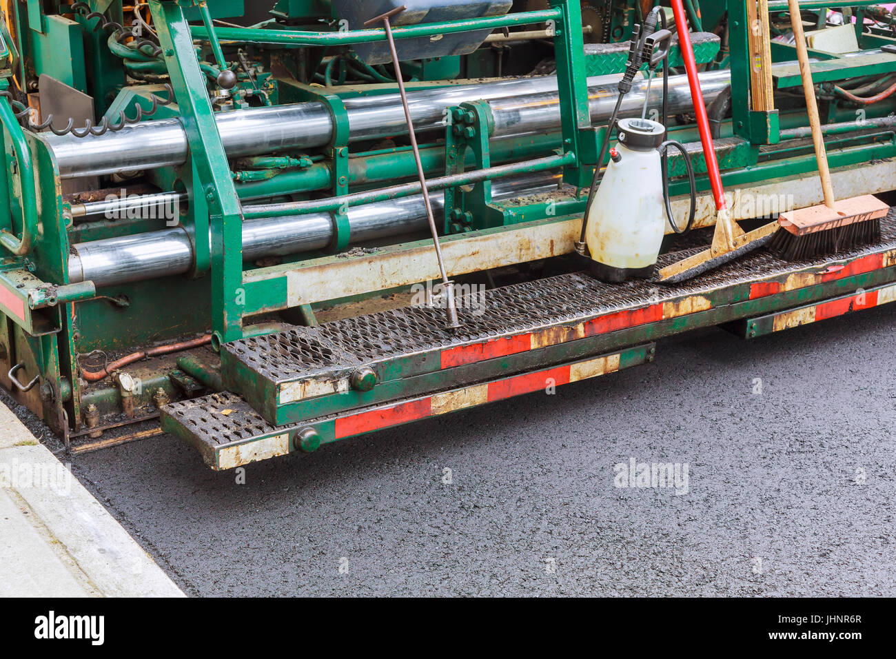 Roller Compactor on Fresh Asphalt Road Installation of asphalt Stock ...