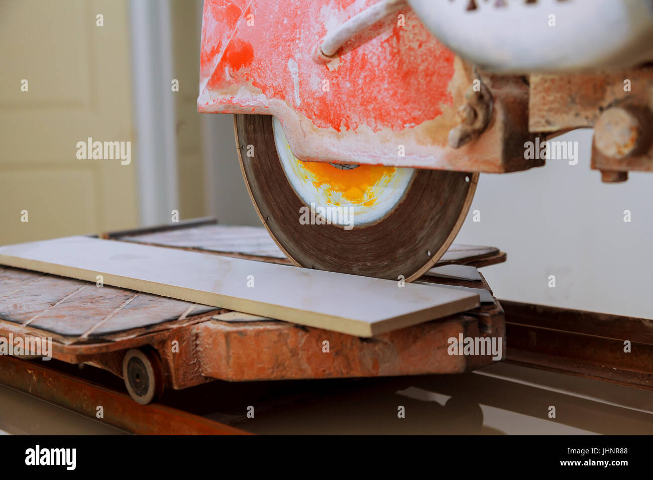 Machine has sharp blade which makes clean cut in stone or granite. It ...